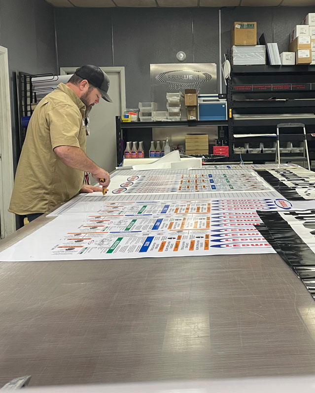 Built to Stick: Inside the Graphics Department - Ledwell - Custom Truck ...